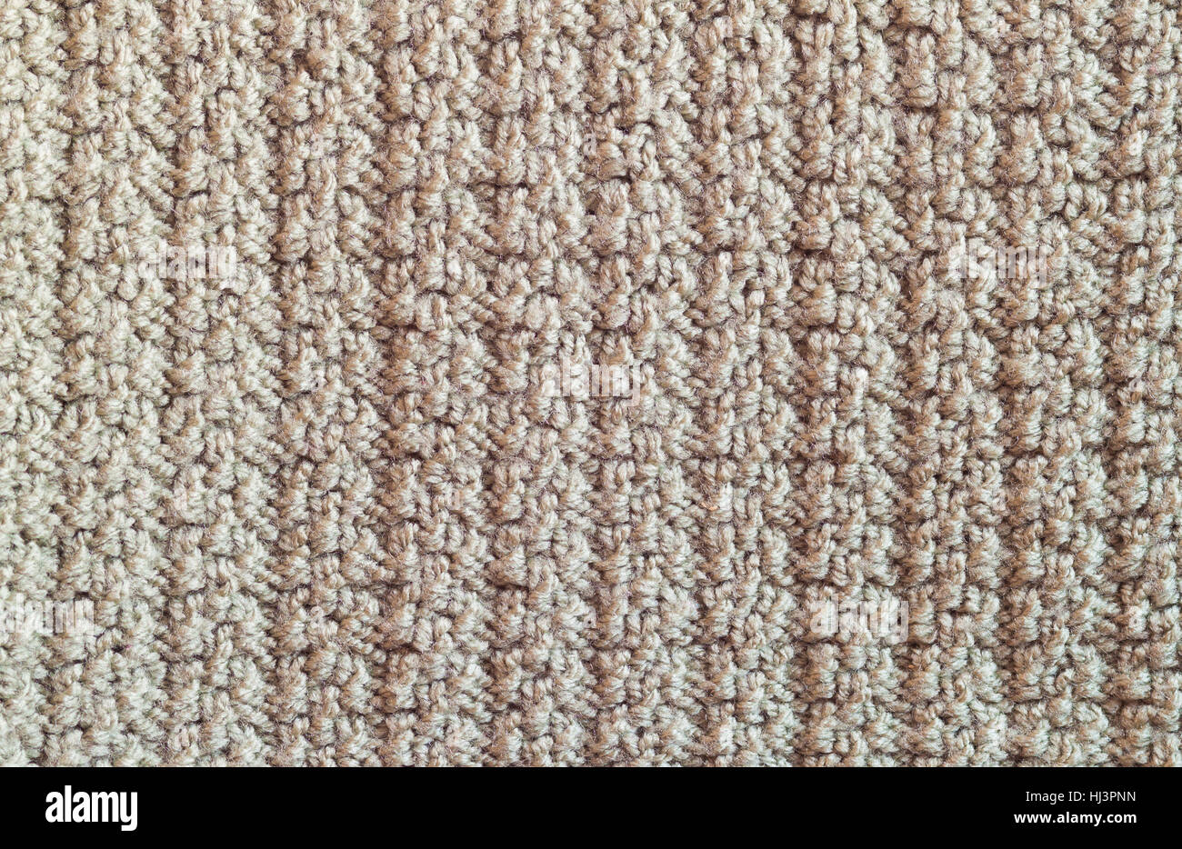 Creamy wool knitted warm clothes for the winter fabric texture ...