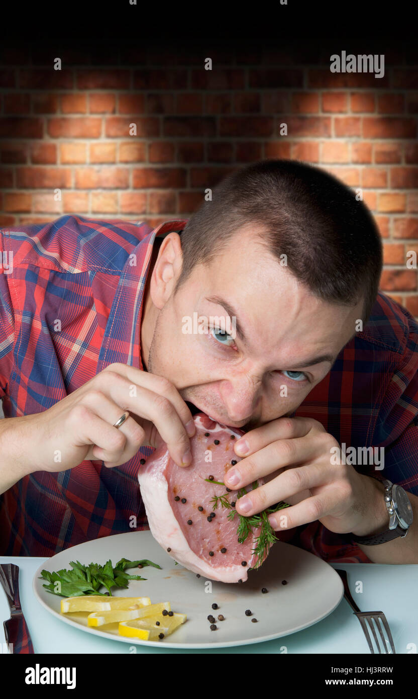 Angry man table fork hi-res stock photography and images - Alamy