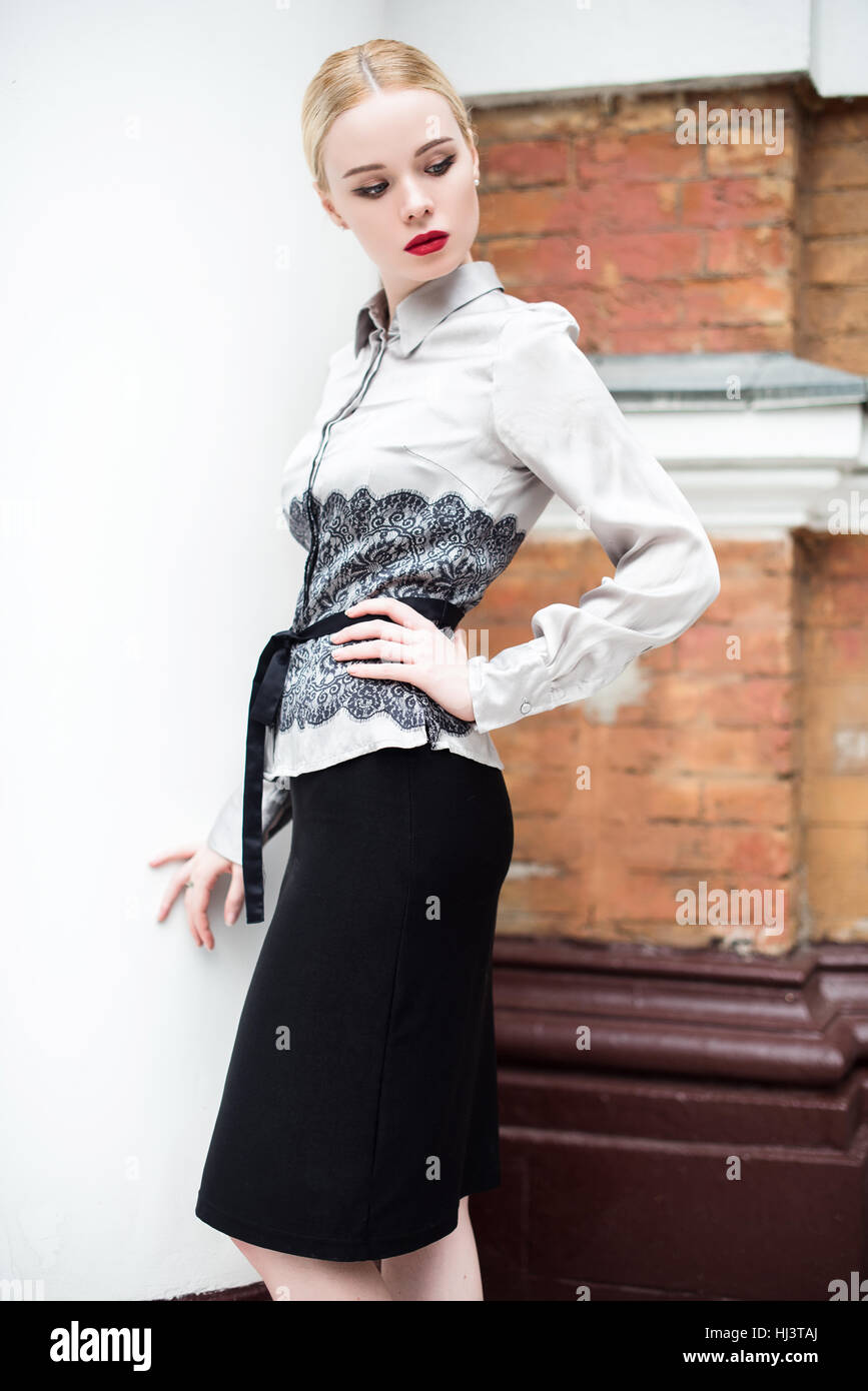 Pretty young business woman wearing formal clothes Stock Photo - Alamy