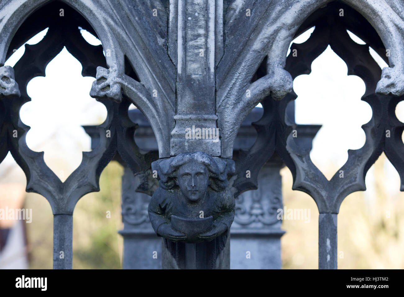 Stone Statue Gravestones in a graveyard Stock Photo - Alamy