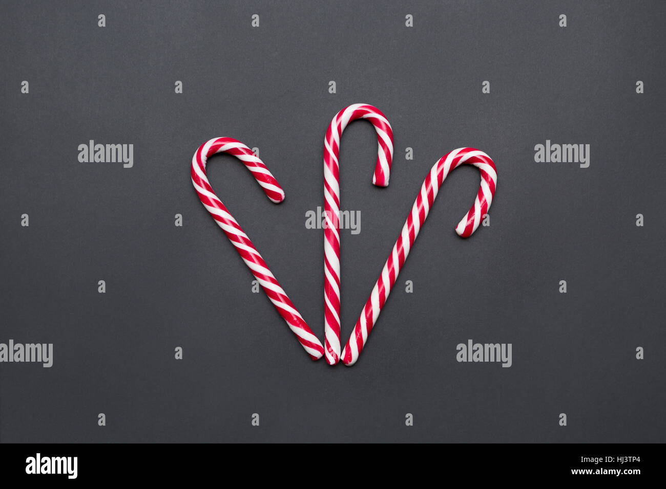 Three Candy Canes Together Stock Photo - Alamy