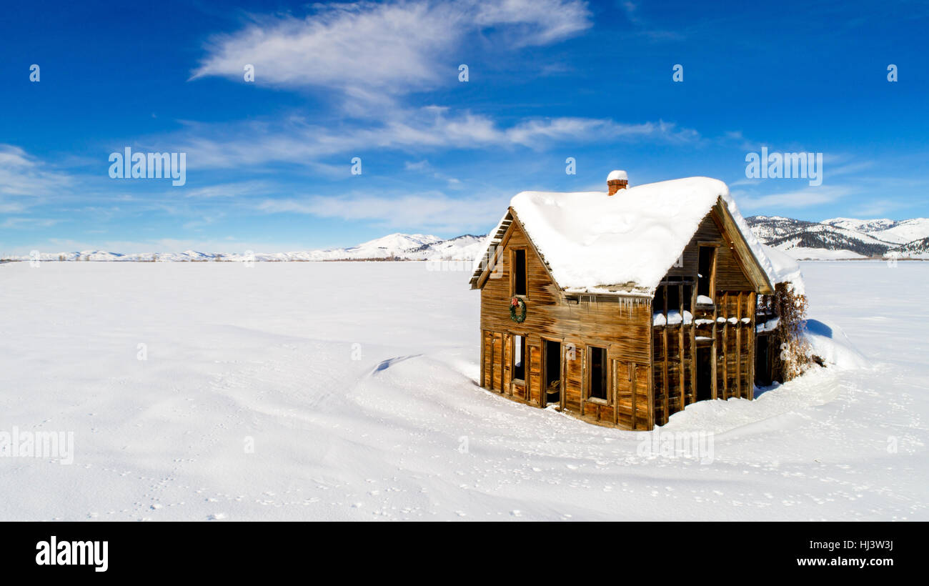 Old winter homestead with a Christmas wreath on the front Stock Photo ...