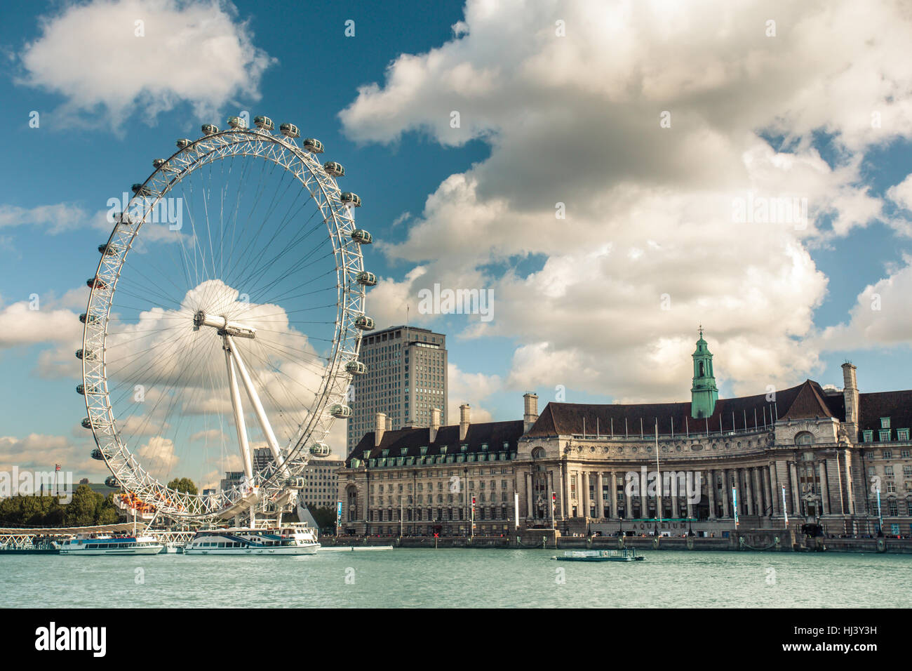 Daytime view of the London Eye from the Thames Stock Photo - Alamy