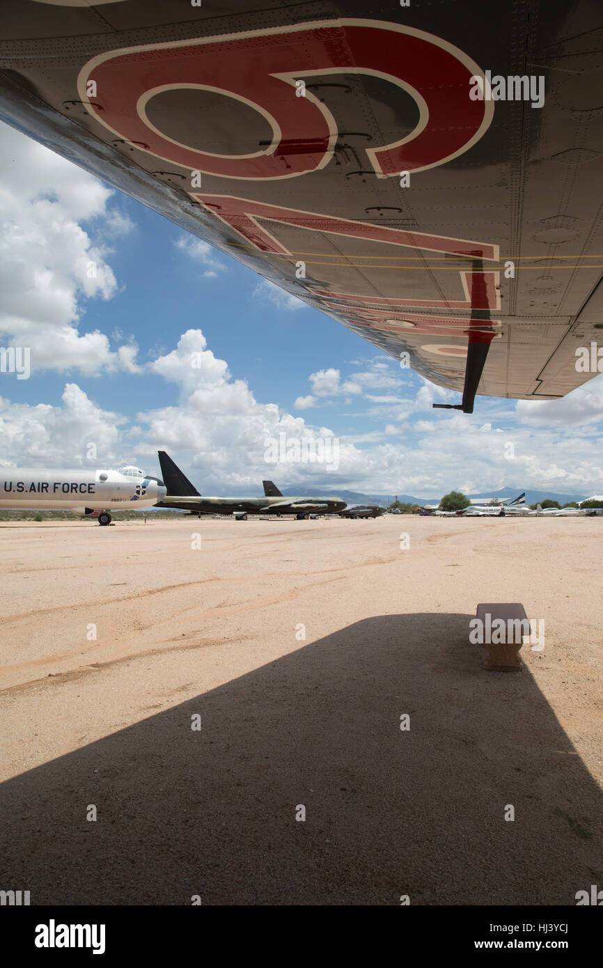 Bench for museum visitors in the shade of an airplane wing at Pima Air ...