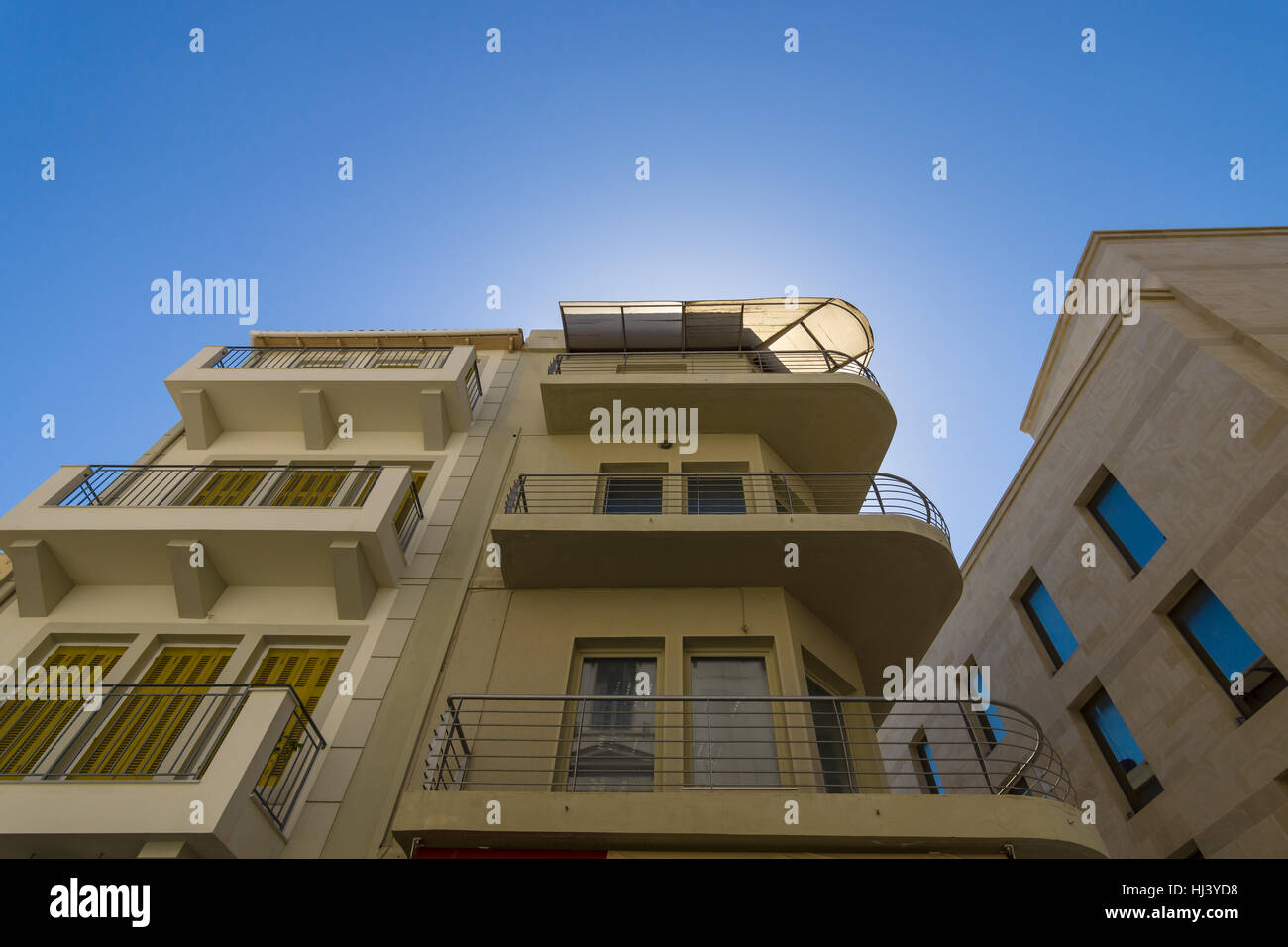 Facade of a typical and a modern residential building in the center of ...