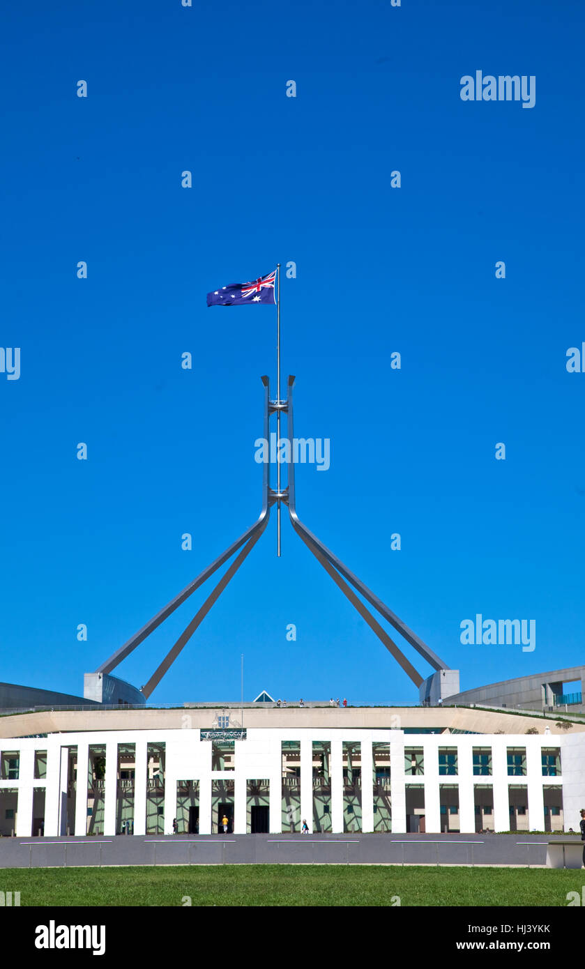 Australian Parliament building with giant flag Stock Photo - Alamy
