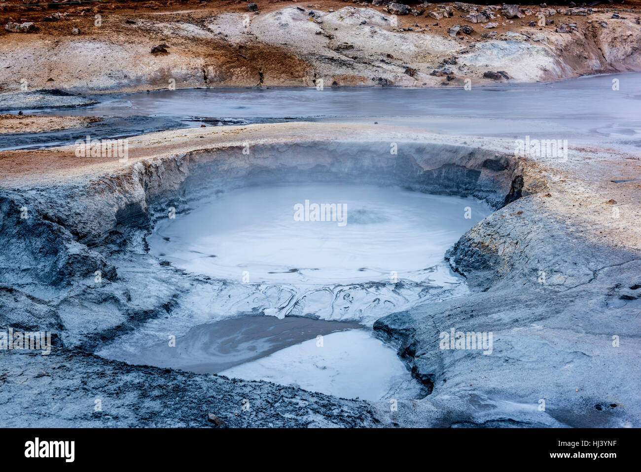 Natural steam rising from volcanic vents in the earth at Hverir in ...