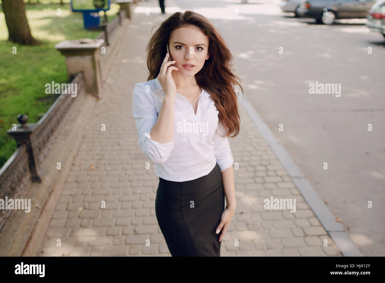 business woman enjoys gadgets Stock Photo - Alamy