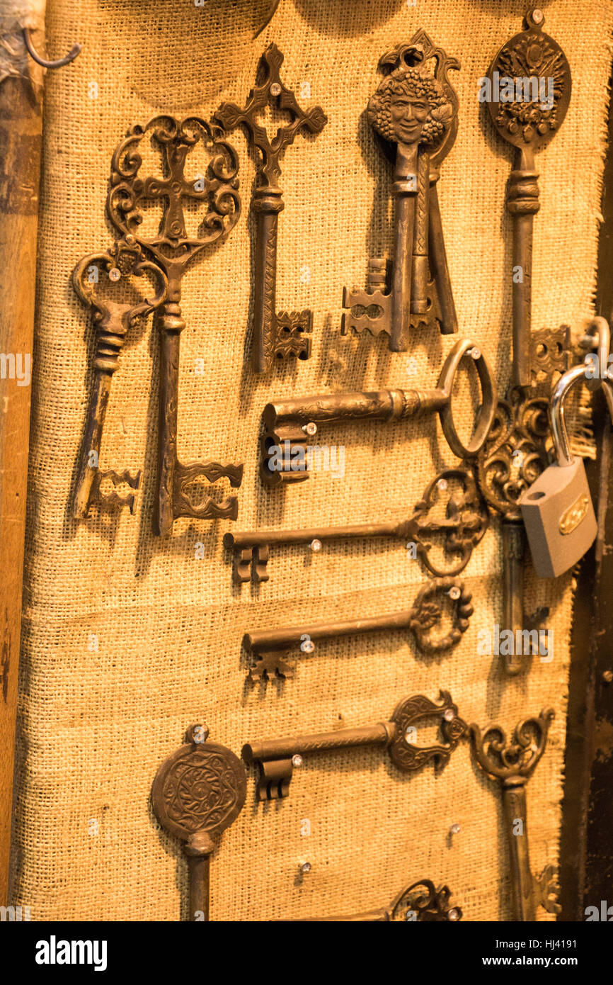 Retro styled keys are hanging on a wall Stock Photo - Alamy