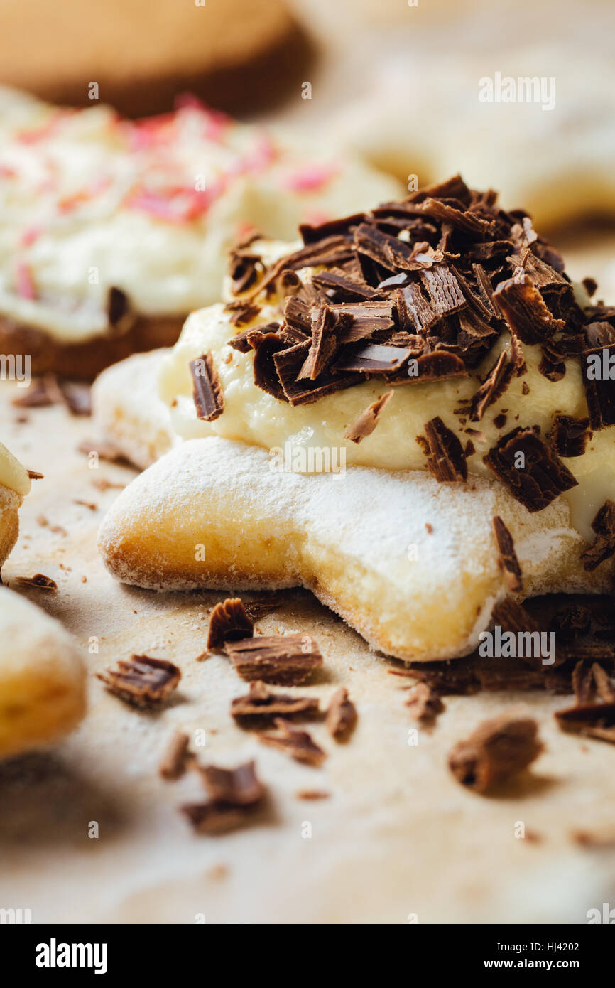 Colorful cookie with chocolate on the top. Vertical studio shot Stock ...