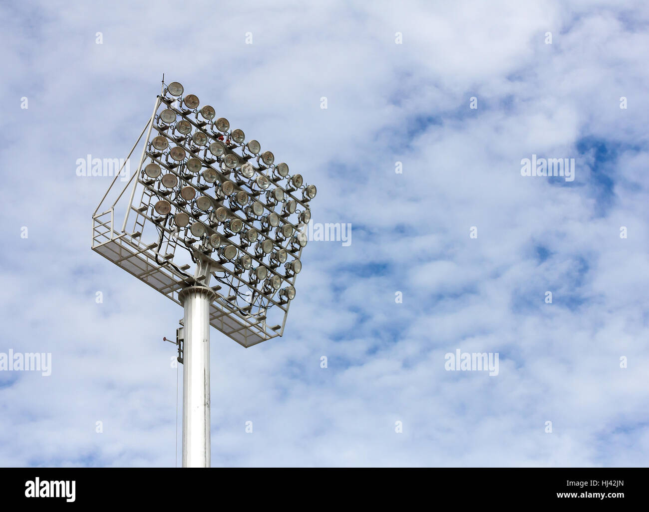 The Stadium Spot-light tower over Blue Sky Stock Photo - Alamy