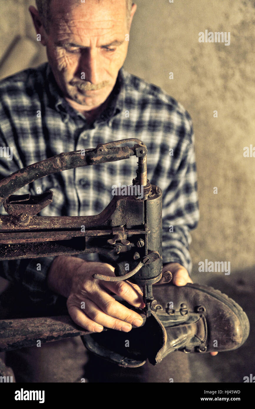 Tool shoemaker aged old man hi-res stock photography and images - Alamy