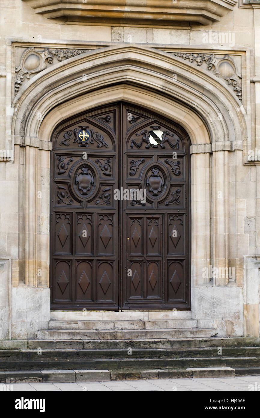 Ornate wooden college door entrance, City of Oxford, Britain, UK Stock ...