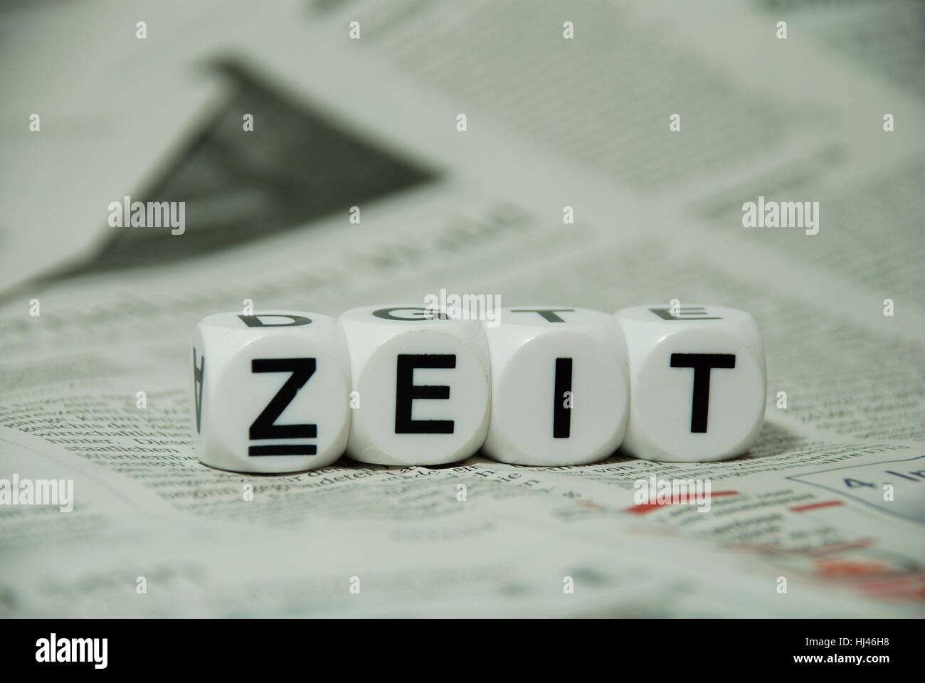 the german word Zeit on a newspaper background Stock Photo - Alamy