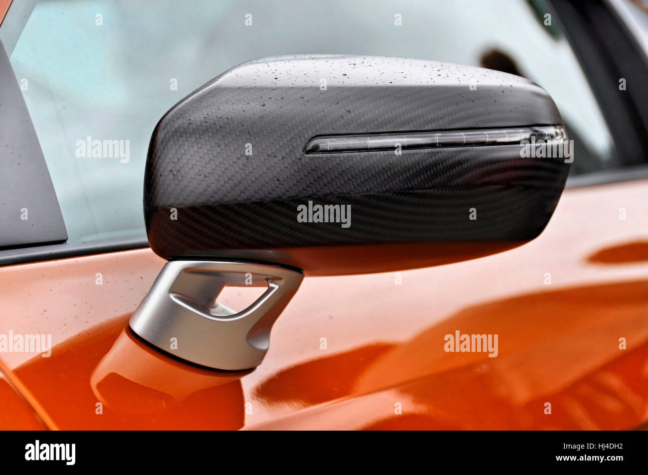 Supercar carbon fibre wing mirror Stock Photo - Alamy