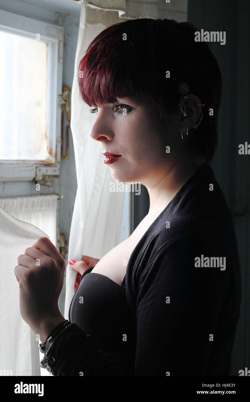 Nosey woman window hi-res stock photography and images - Alamy