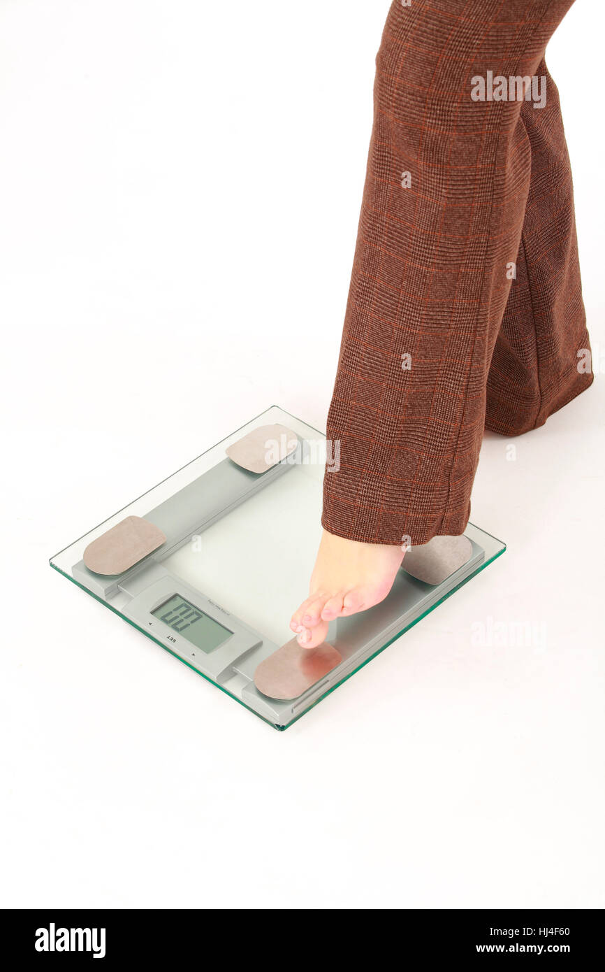 Female wont use the scale Stock Photo - Alamy