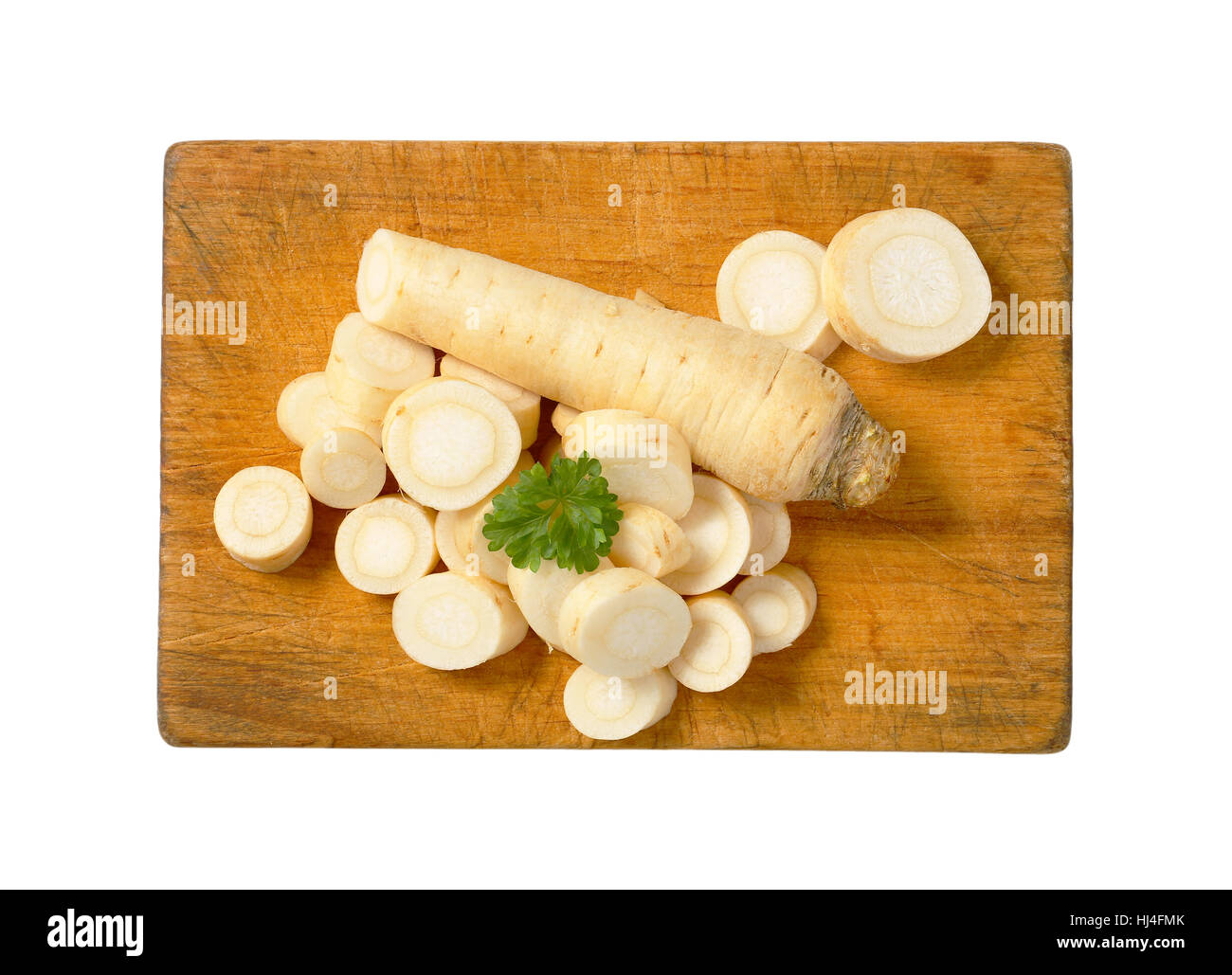 sliced parsley root on wooden cutting board Stock Photo - Alamy