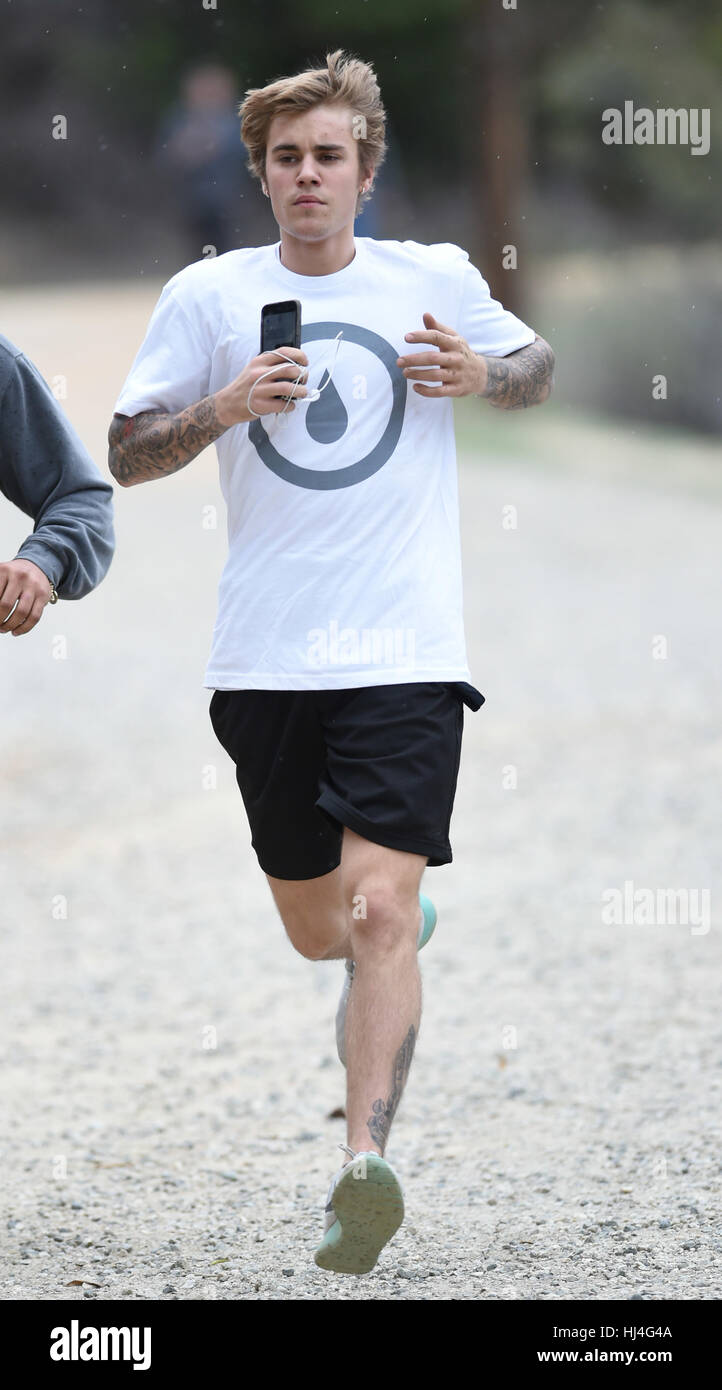 Justin Bieber takes a run on a rainy windy day Featuring: Justin Bieber ...
