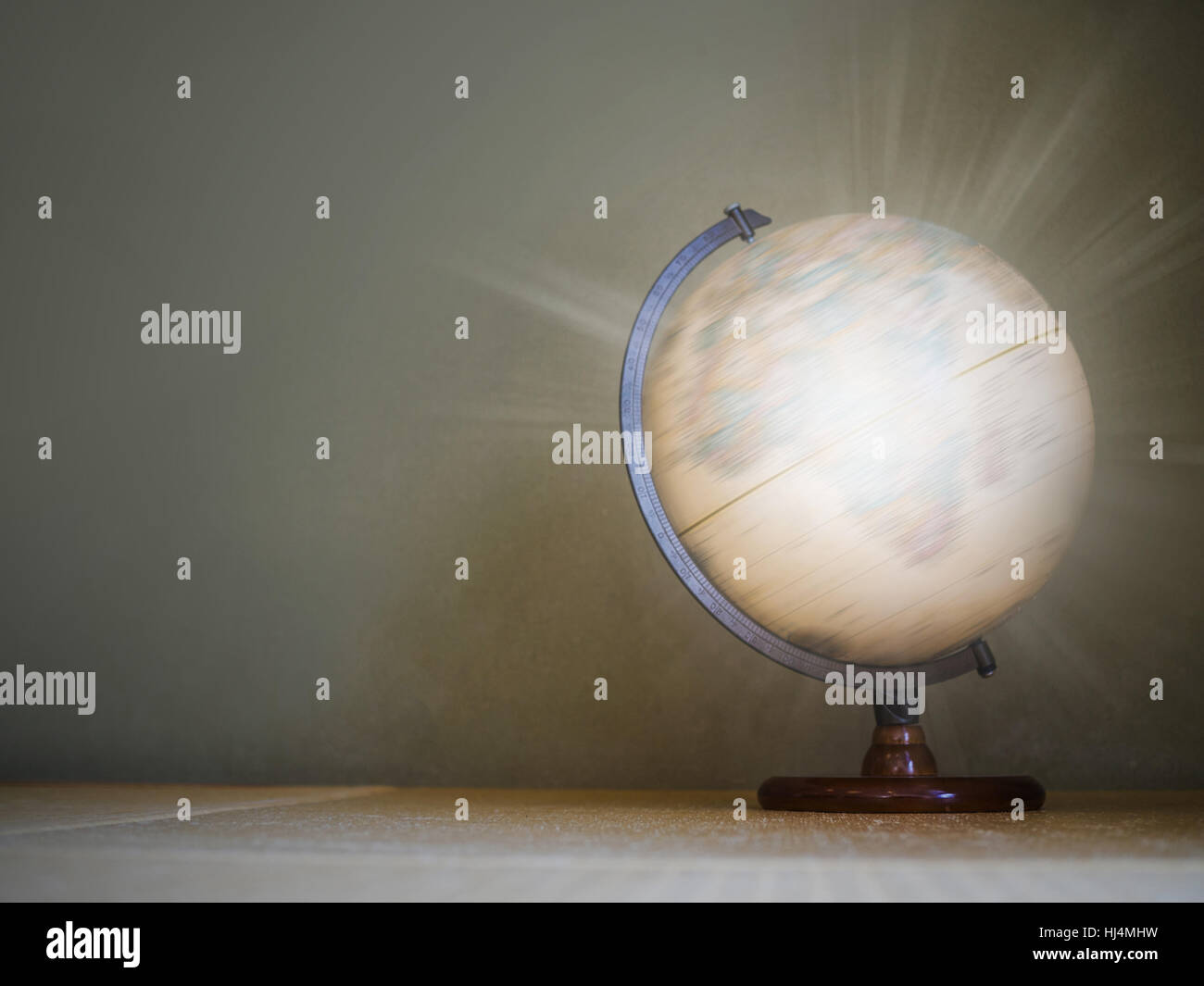 Light effect on spinning globe model Stock Photo - Alamy