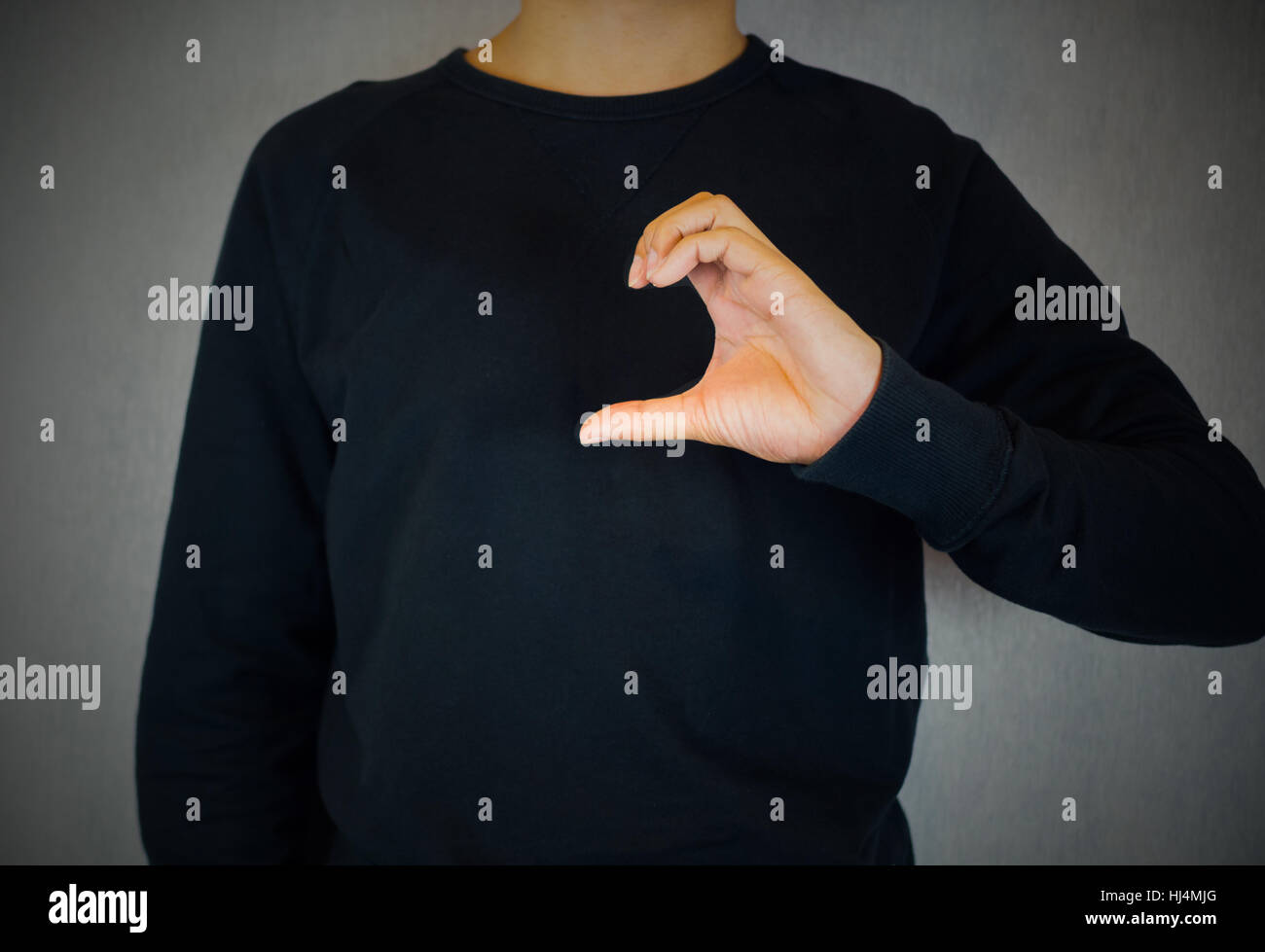 Half Heart shape hand gesture Stock Photo - Alamy