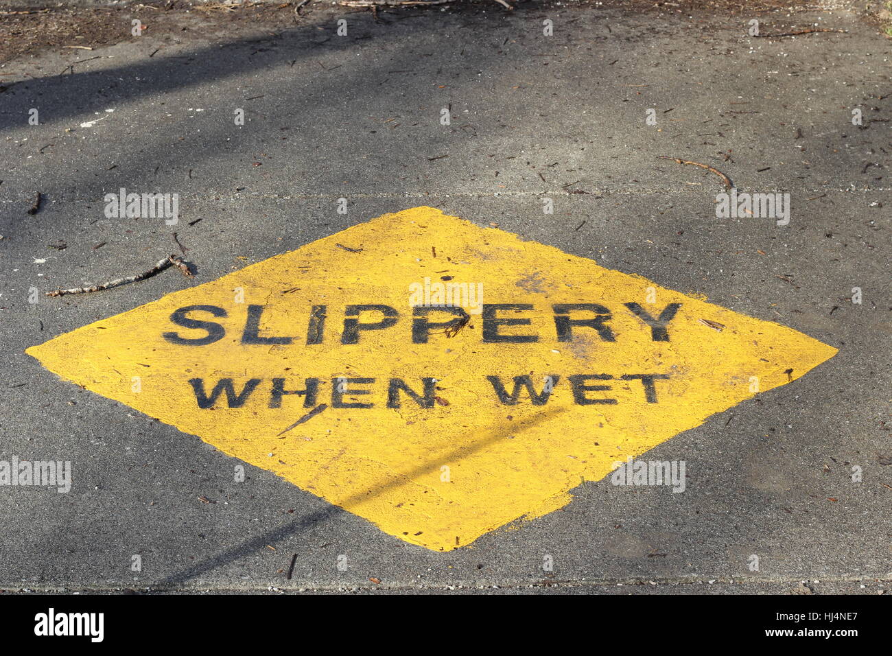 Slippery when wet sign hi-res stock photography and images - Alamy