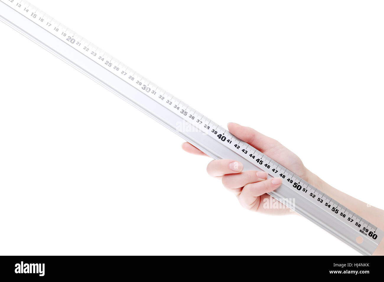 Hand holding metal ruler isolated on white background Stock Photo - Alamy