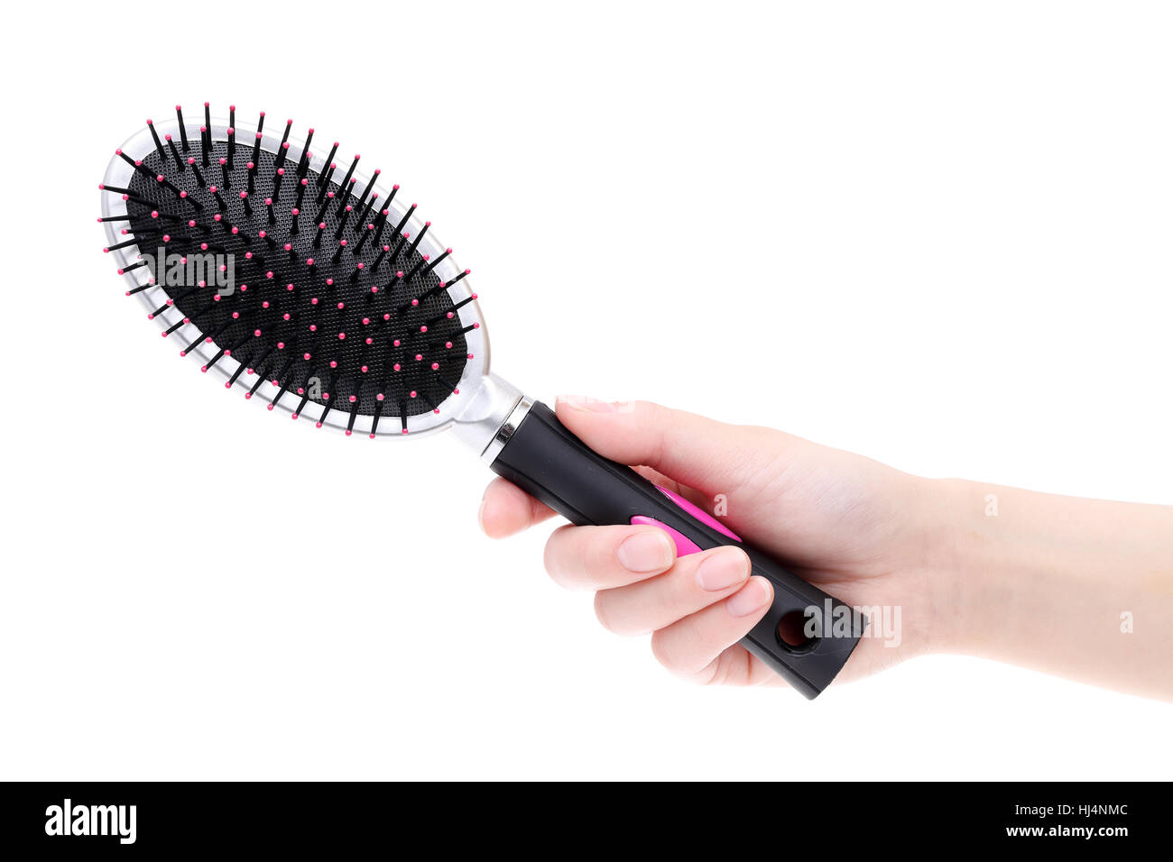 Hand holding plastic hairbrush isolated on white background Stock Photo ...