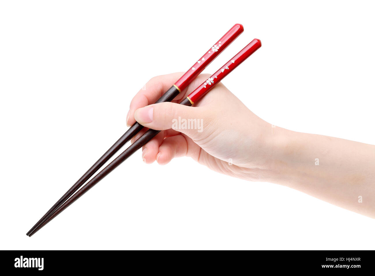 Hand holding red chopsticks isolated on white background Stock Photo ...
