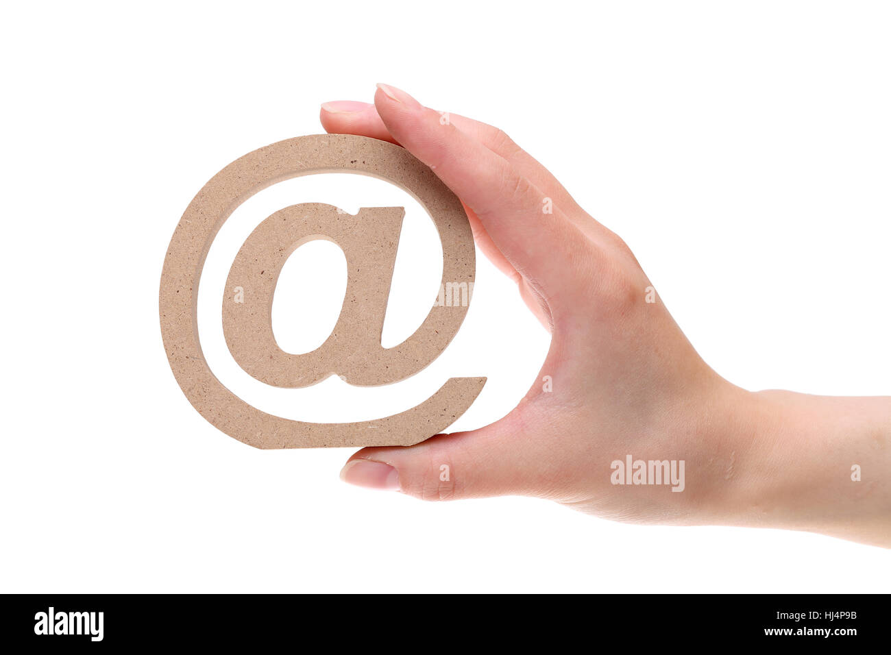 Hand holding wooden email symbol isolated on white background Stock ...
