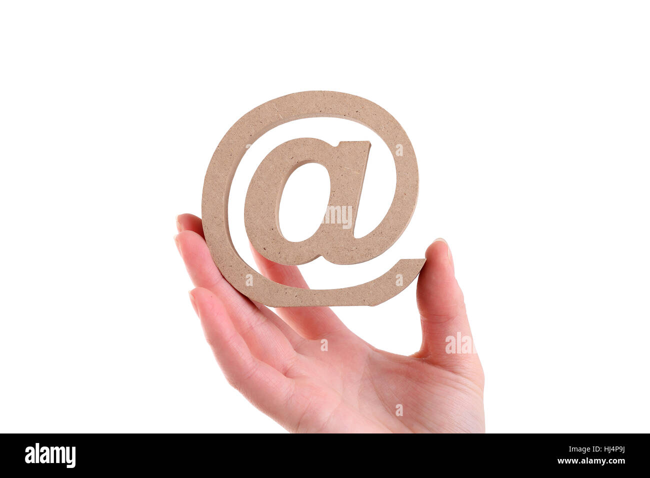 Hand holding wooden email symbol isolated on white background Stock ...