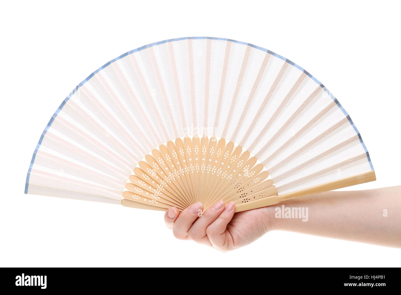 Hand holding folding fan isolated on a white background Stock Photo - Alamy