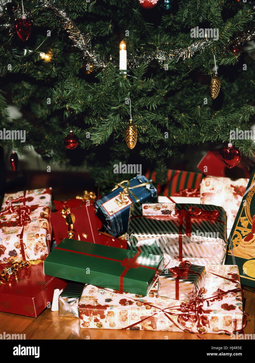 CHRISTMAS PACKAGES under the Christmas tree 2015 Stock Photo - Alamy