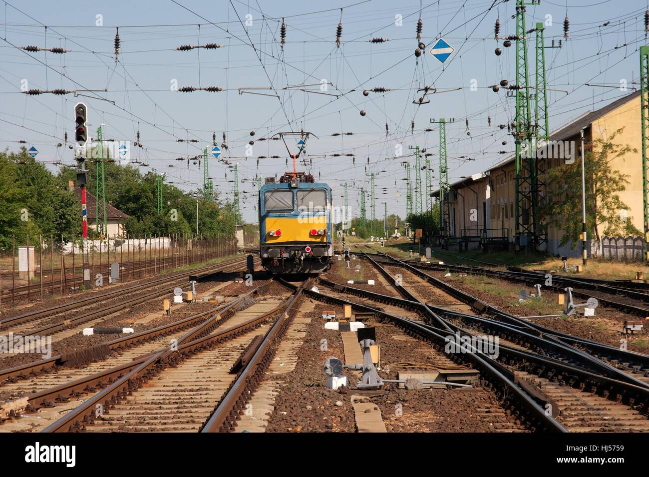 Complex railway track system with an engine Stock Photo - Alamy