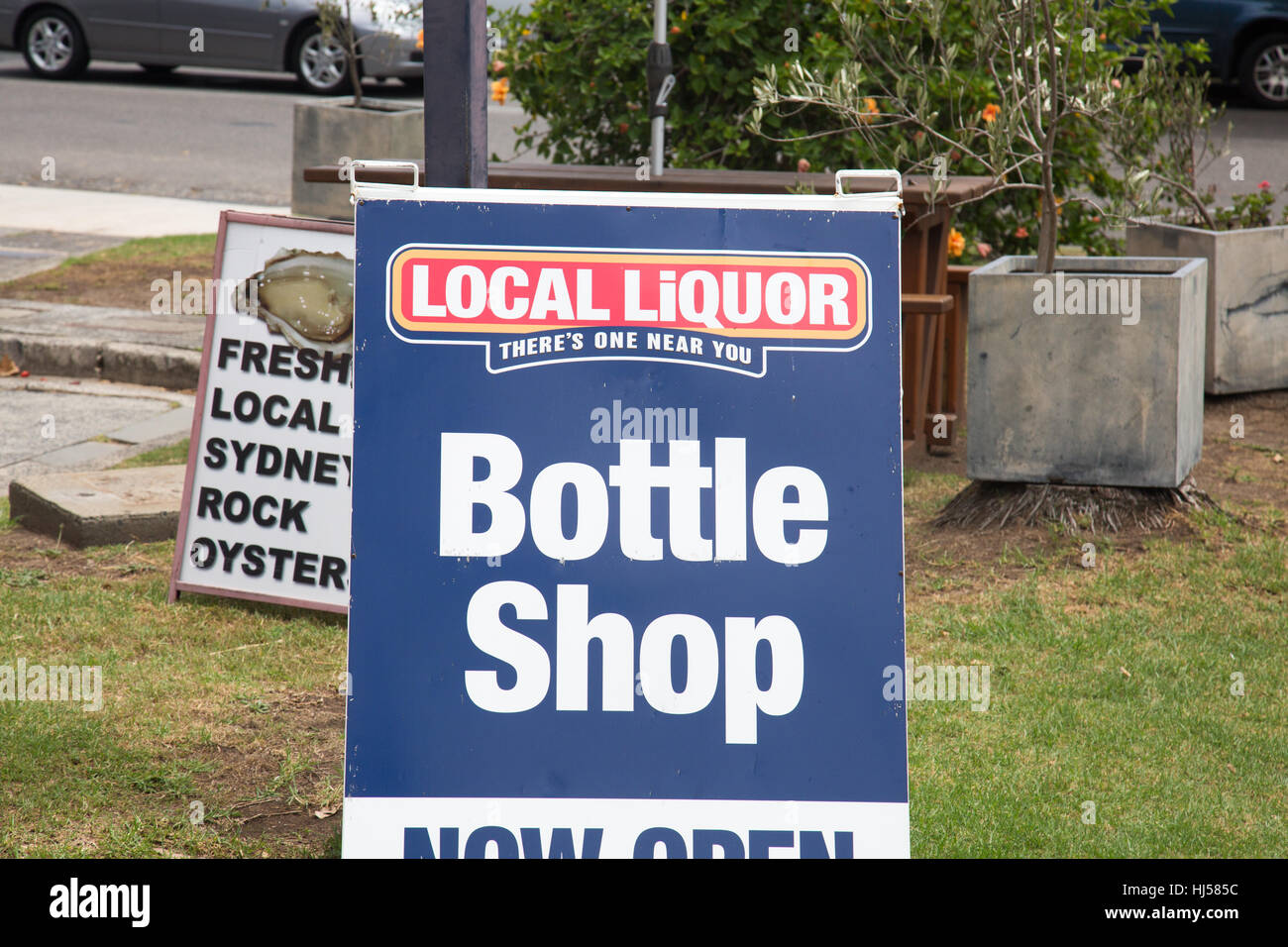 Sign for Sydney rock oysters and bottle shop store,Australia Stock ...