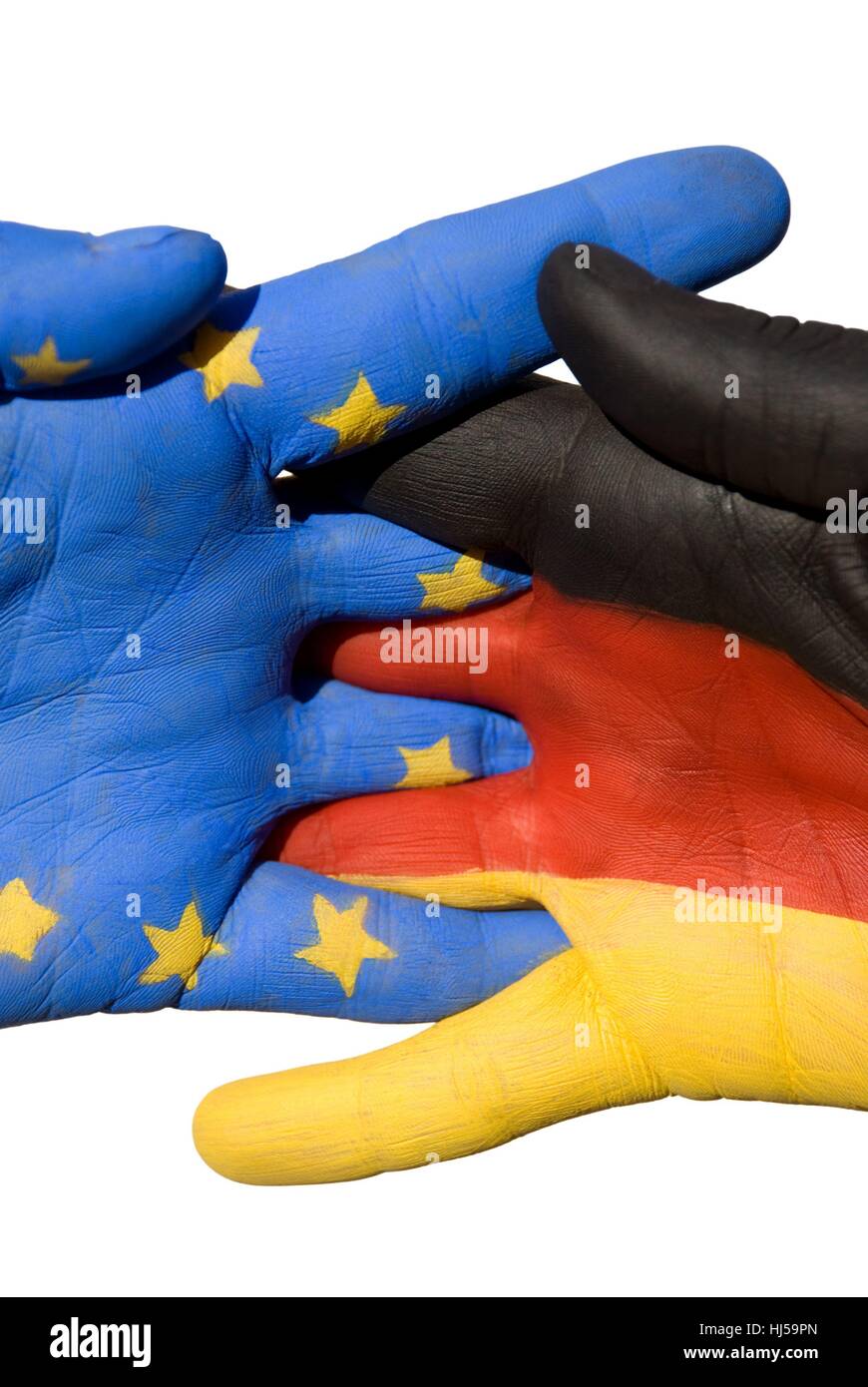 two hands in a handshake, one hand painted with german, the other with ...