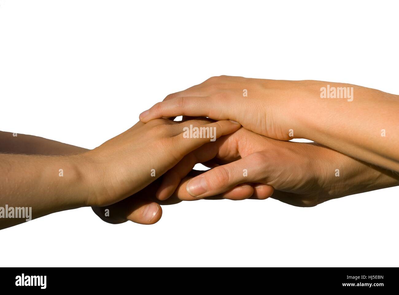 four hands symbolizing teamwork and power Stock Photo - Alamy