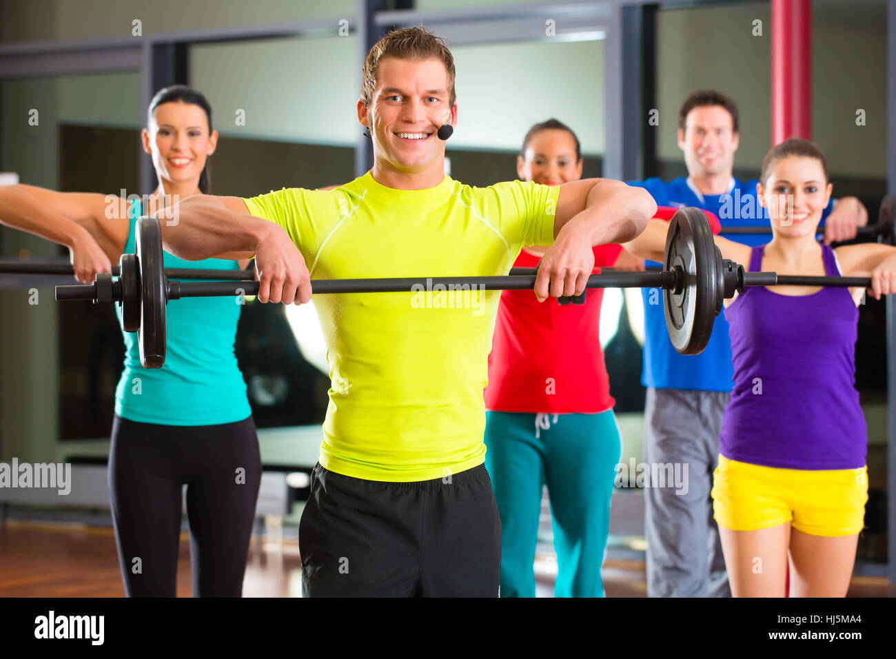 group with weight training in the gym Stock Photo - Alamy