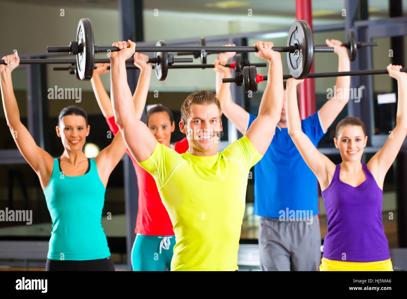group with weight training in the gym Stock Photo - Alamy