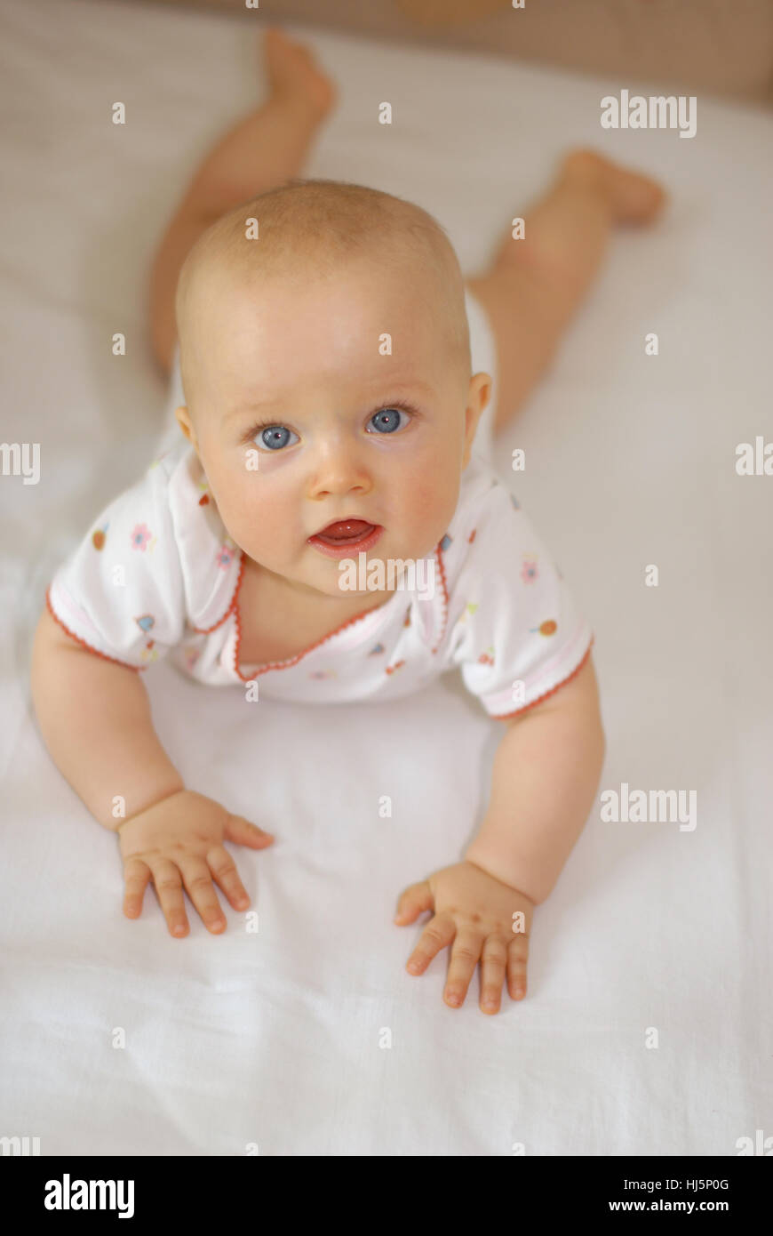 Baby is lying prone hi-res stock photography and images - Alamy