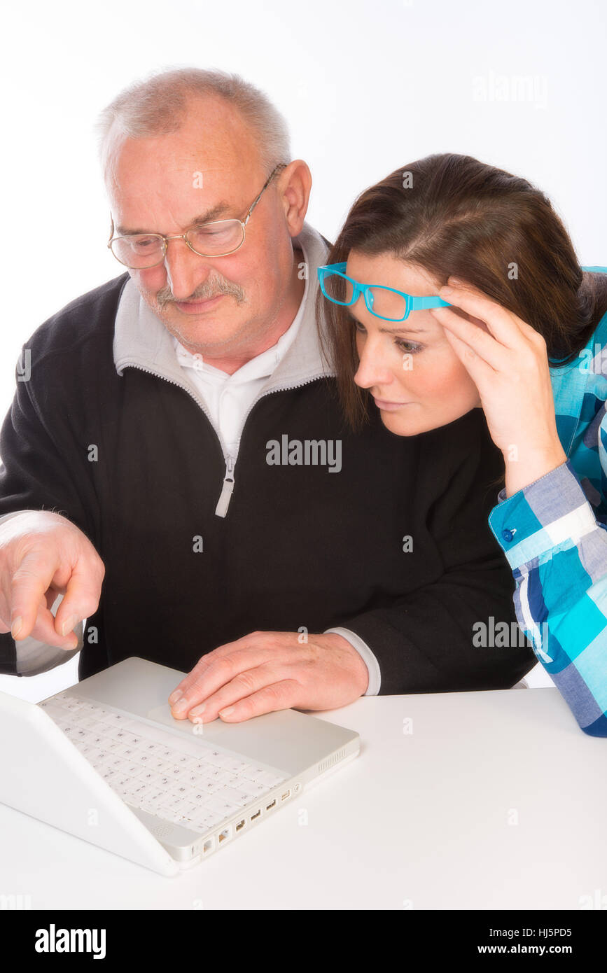 helping with new computer Stock Photo - Alamy