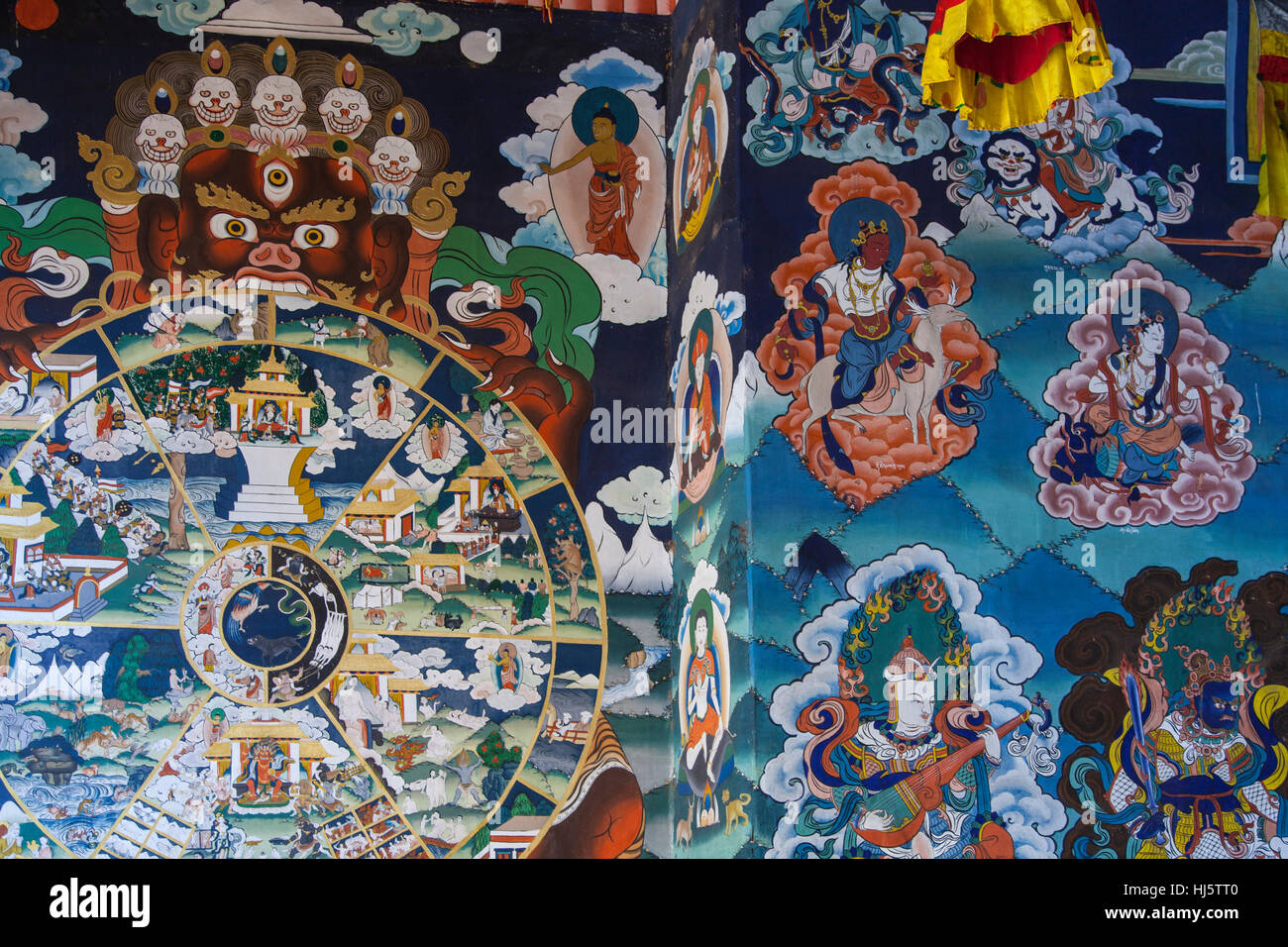 Yama, Lord of Death, holds the Buddhist Wheel of Life in the entrance ...