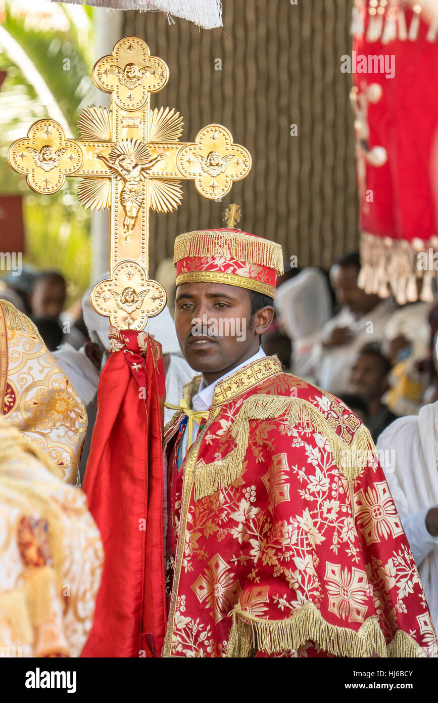 Addis Ababa - Jan 19: A priest wearing a colorful traditional gown ...