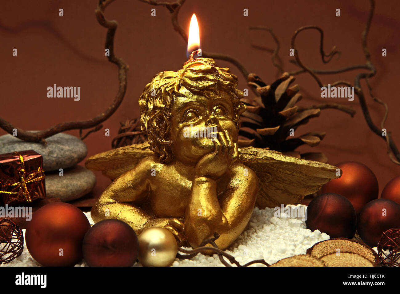 angel candle gold Stock Photo - Alamy