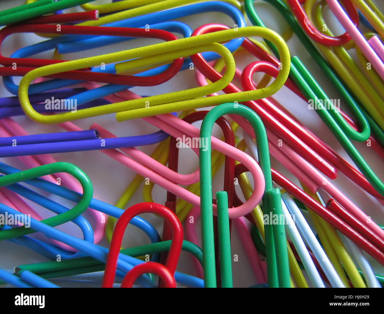 A photograph of plastic coated paper clips Stock Photo - Alamy