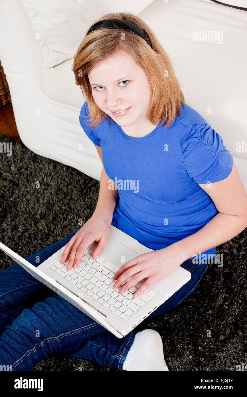 teens girl laughing at the computer Stock Photo - Alamy