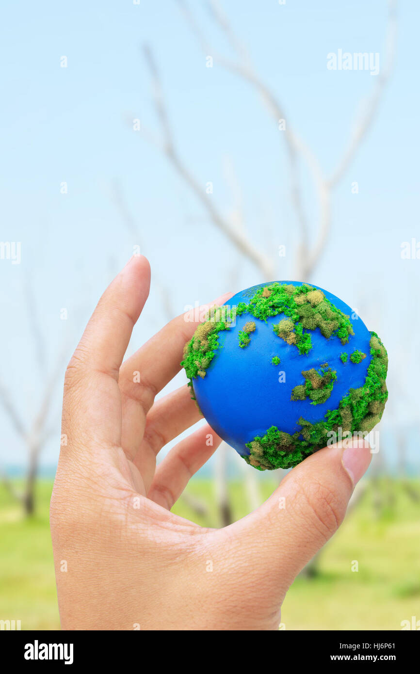 Hands and Earth Concept Save green planet Stock Photo - Alamy