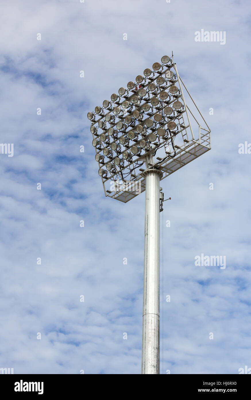 The Stadium Spot-light tower over Blue Sky Stock Photo - Alamy