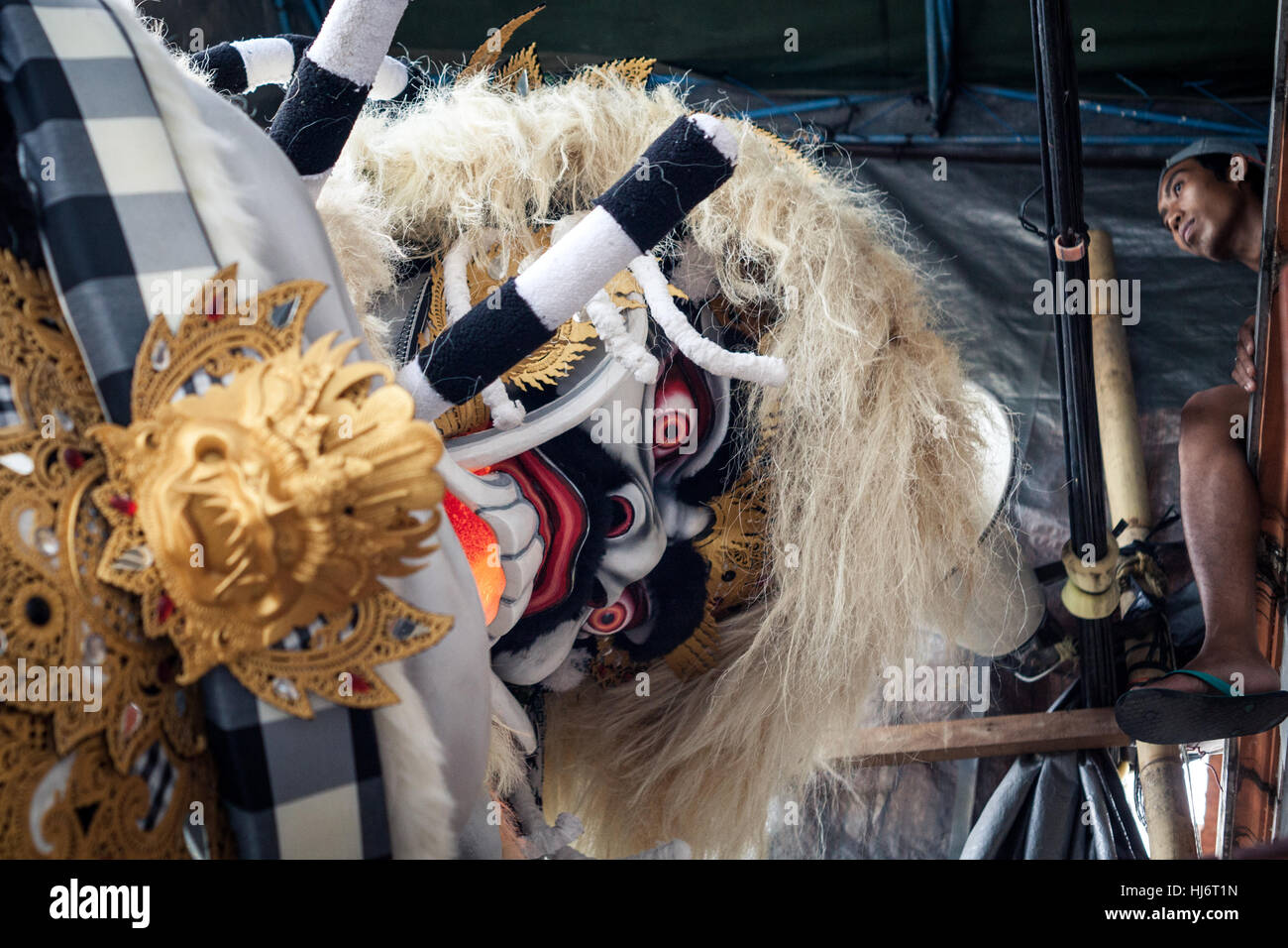 Indonesian man overlooks a huge Ogoh-Ogoh statue he is creating for the ...