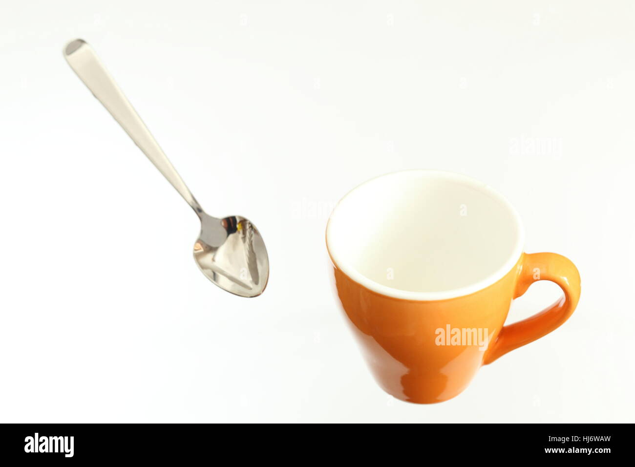 spoon and cup Stock Photo - Alamy